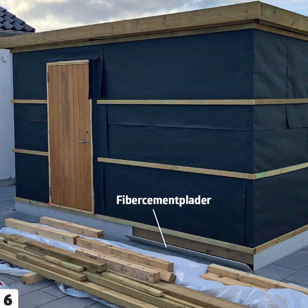 Isoleret skur med listebeklædning | goerdetselv.dk